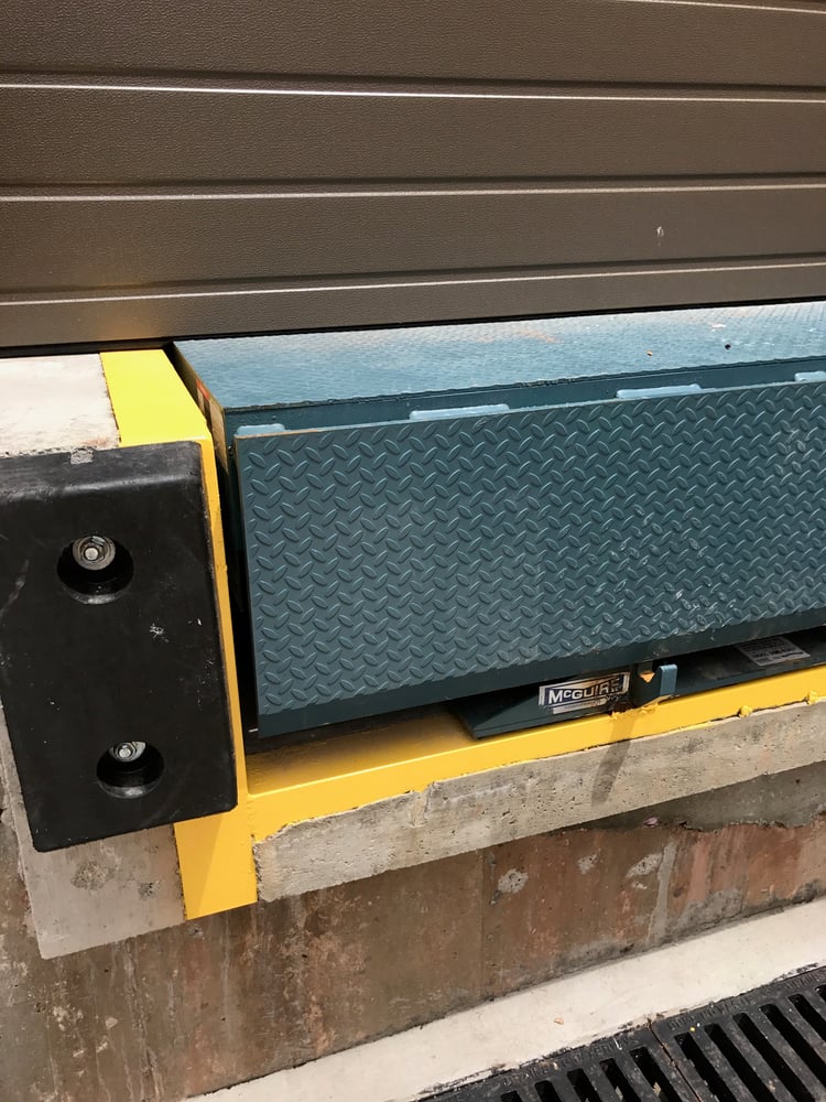 Extended Loading Dock Levelers & Tapered Dock Seals for Declining Driveways Extended Loading Dock Levelers & Tapered Dock Seals for Declining Driveways